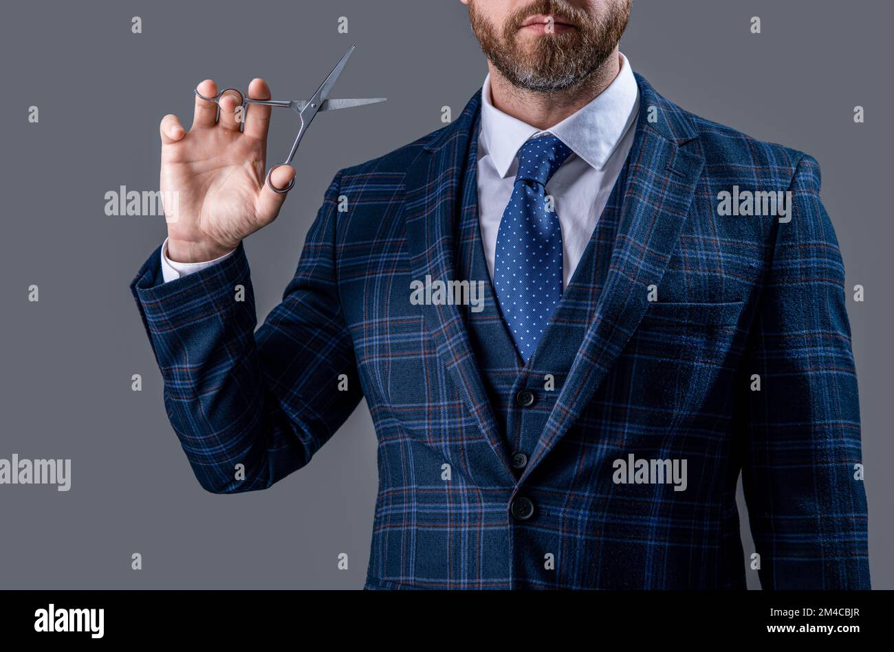 cropped photo of bearded man with barber scissors. barber man hold ...