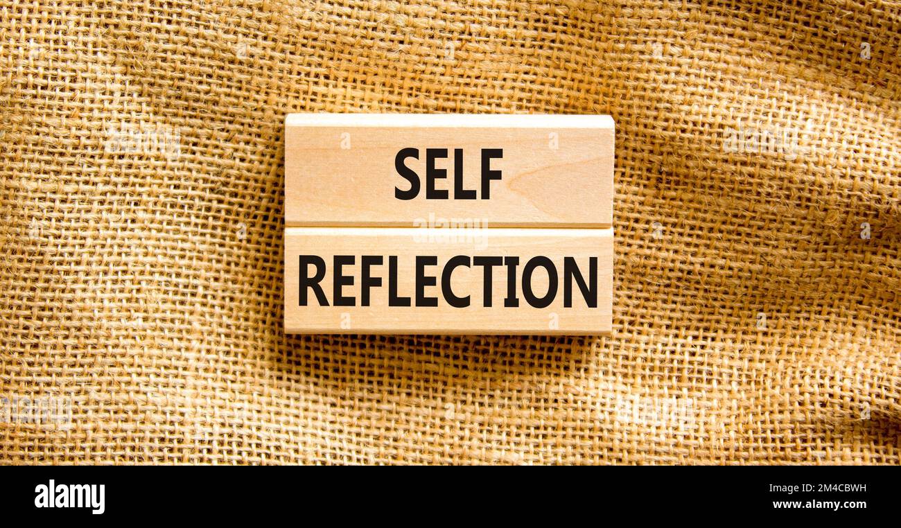 Self reflection symbol. Concept word Self reflection typed on wooden ...