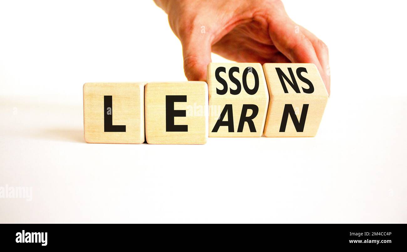 Lessons to learn symbol. Concept word Lessons learn on wooden cubes ...