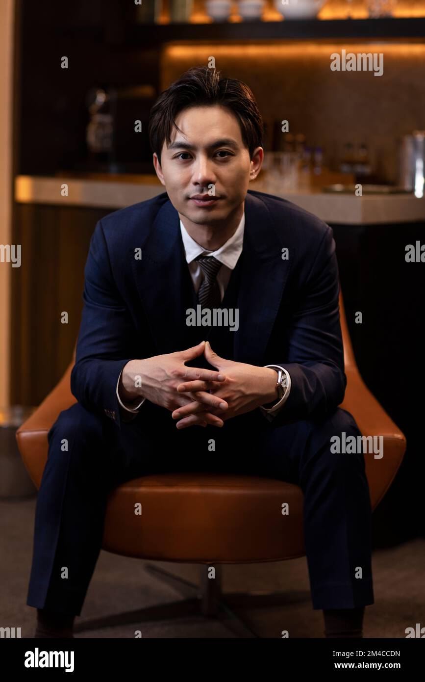 Portrait of elegant Chinese businessman Stock Photo - Alamy