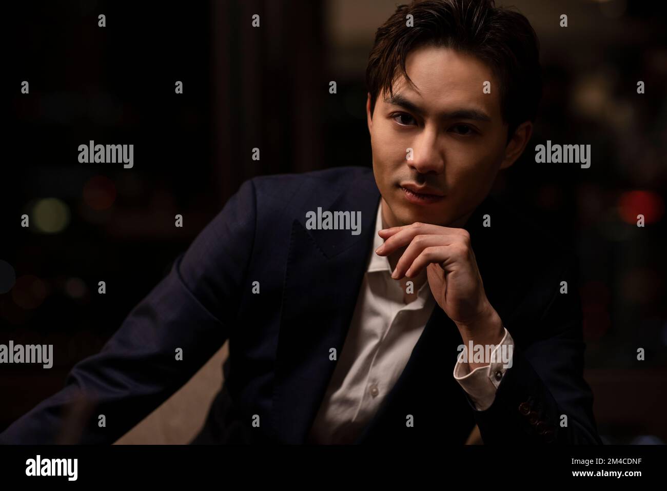 Portrait of elegant young Chinese man Stock Photo - Alamy