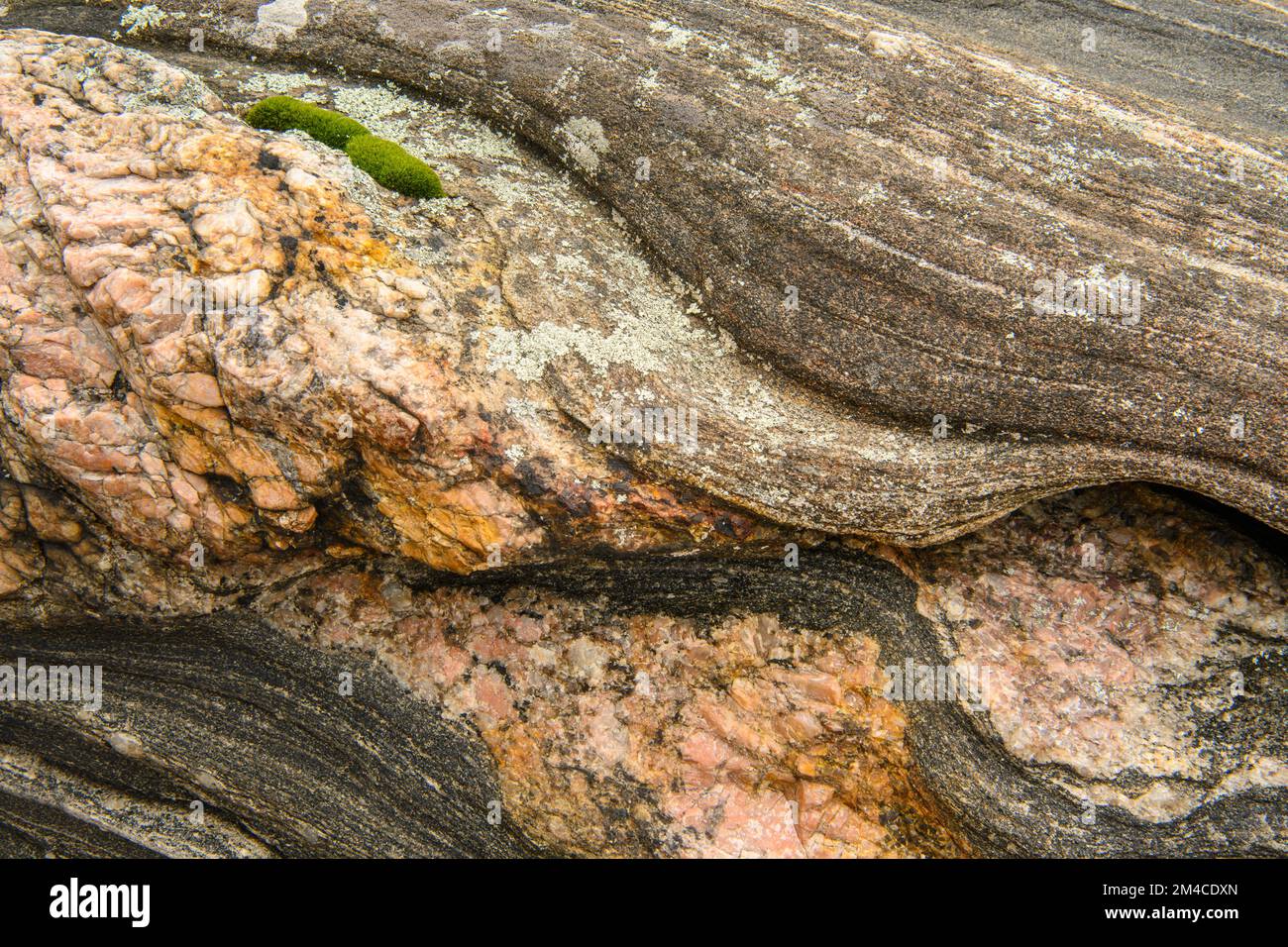 Melting ice, shoreline granite rock on Georgian Bay in early spring ...