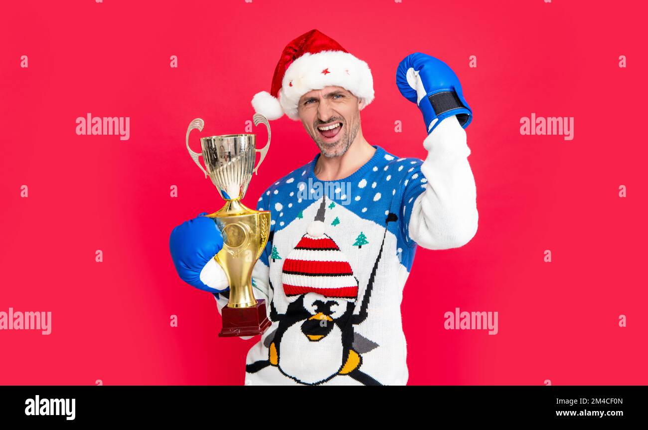 christmas man boxer celebrating victory in studio. man celebrating ...