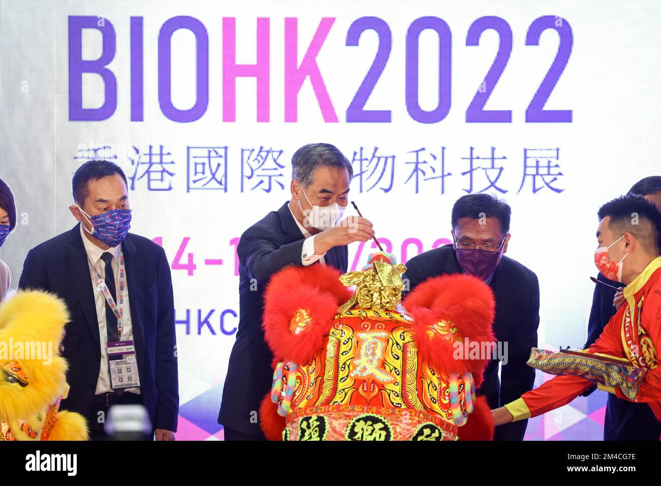 Guests including Leung Chun-ying (centre left) and IT minister ...