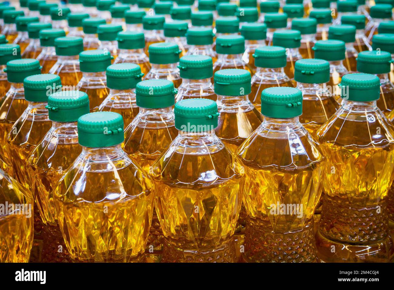 Cooking oil bottles at factory warehouse Stock Photo - Alamy