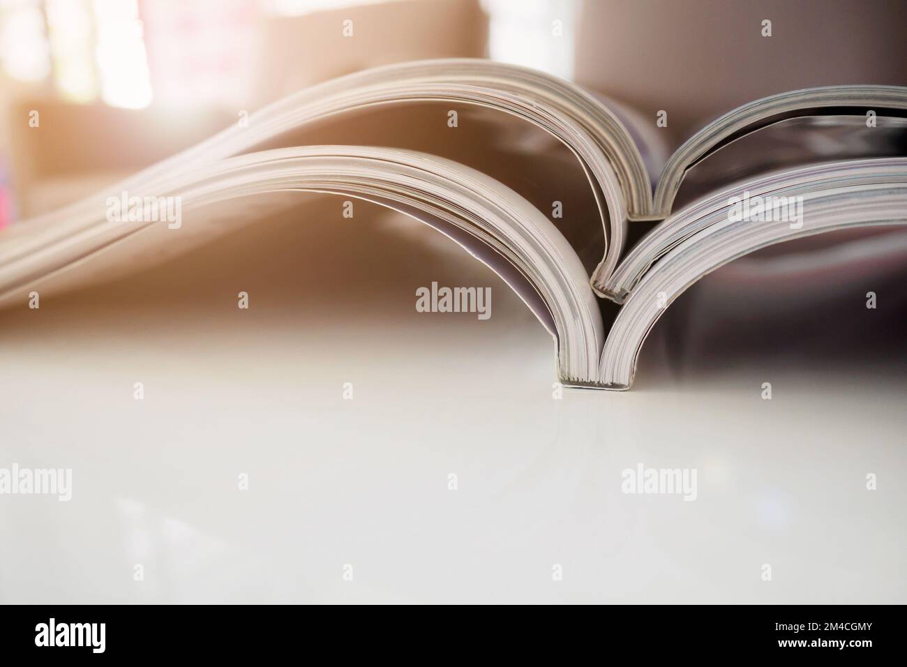 Pile magazines on table hi-res stock photography and images - Alamy