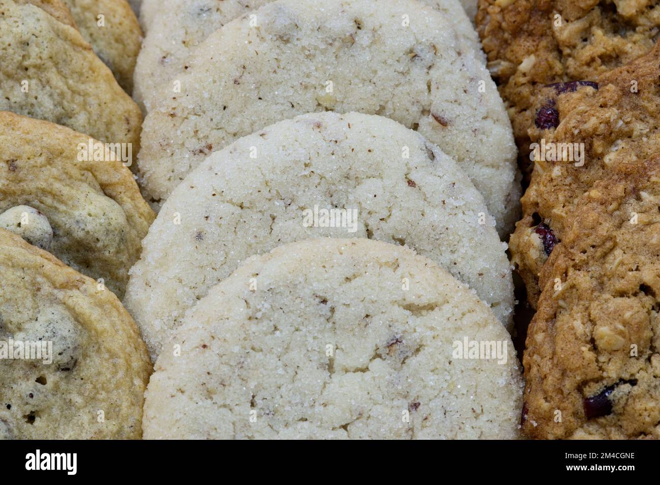 Homemade assorted cookies arranged and displayed in rows vertically ...