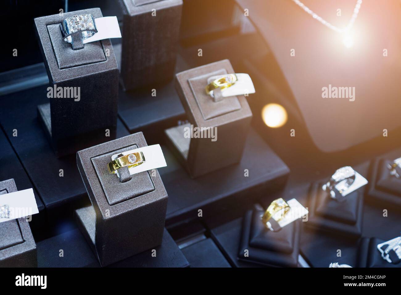 Diamond rings with blank price tag show in jewelry luxury store window ...