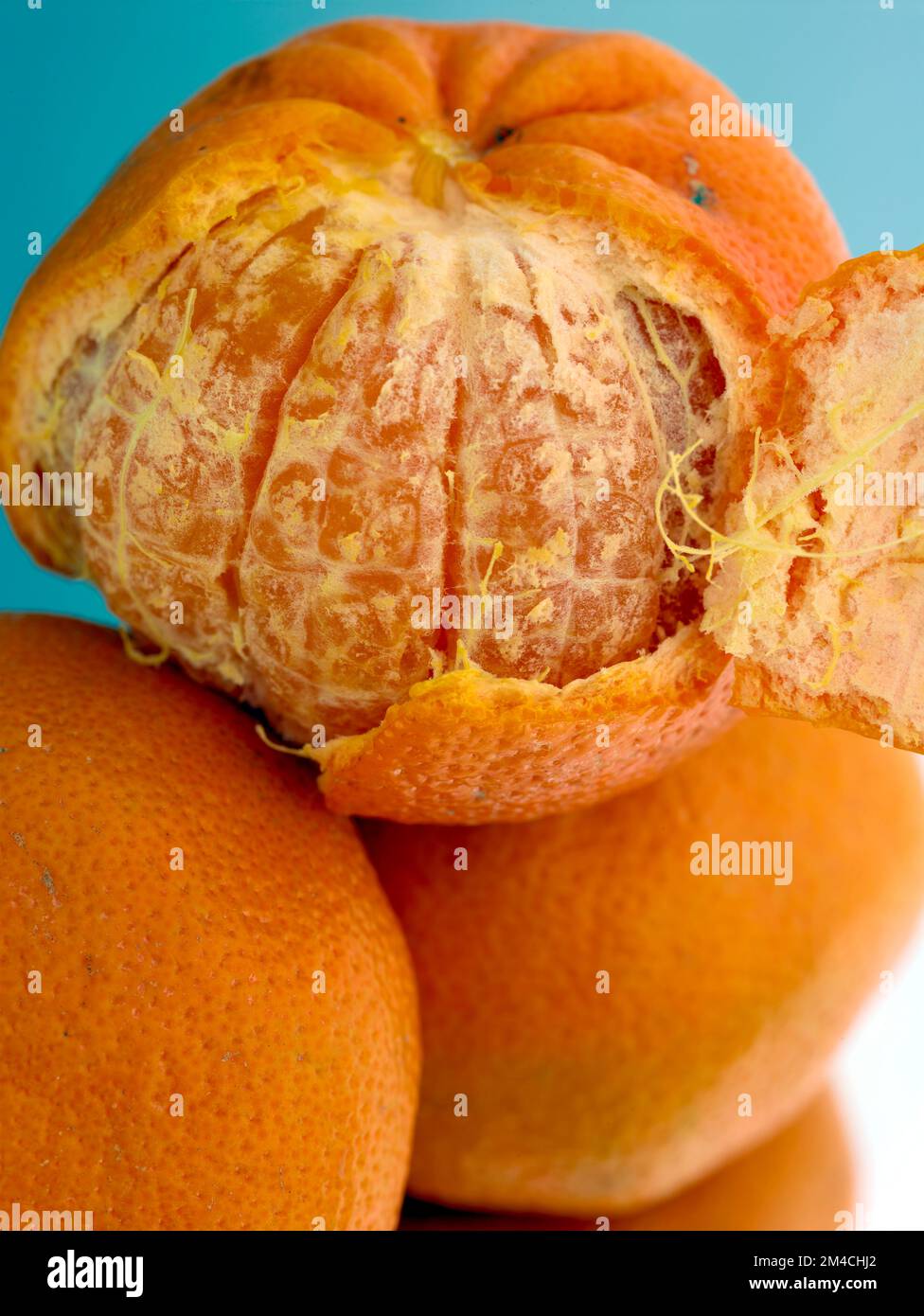 Easy peel sweet Tangerines on clean neutral background. Natural close ...