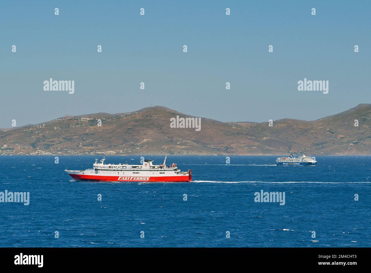 Mykonos, Greece - June 2022: Ferries crossing to and from the Greek ...