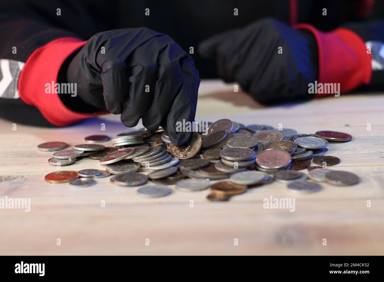 Old person counting coins hi-res stock photography and images - Alamy