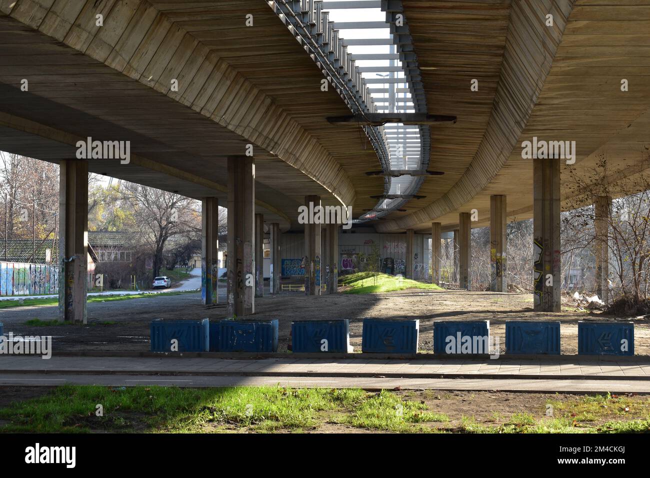 Under the bridge view with a gap between lines Stock Photo - Alamy