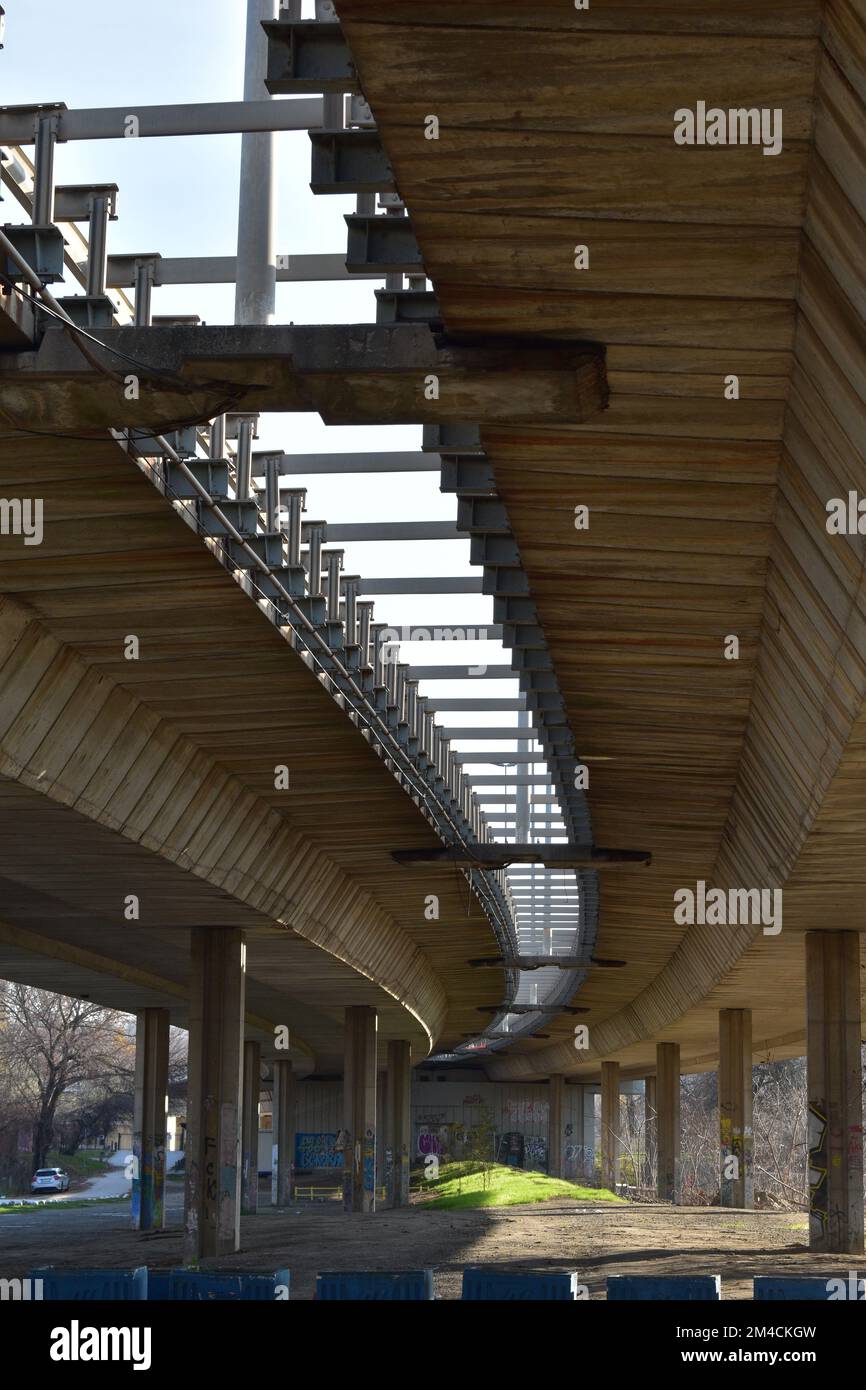 Under the bridge view with a gap between lines Stock Photo - Alamy