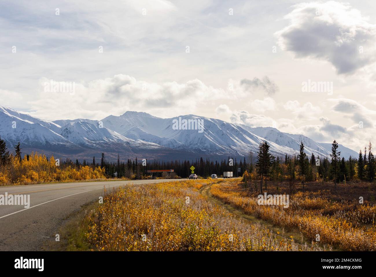 Alaska Highway in the Fall Foliage Snowy Mountains Stock Photo - Alamy