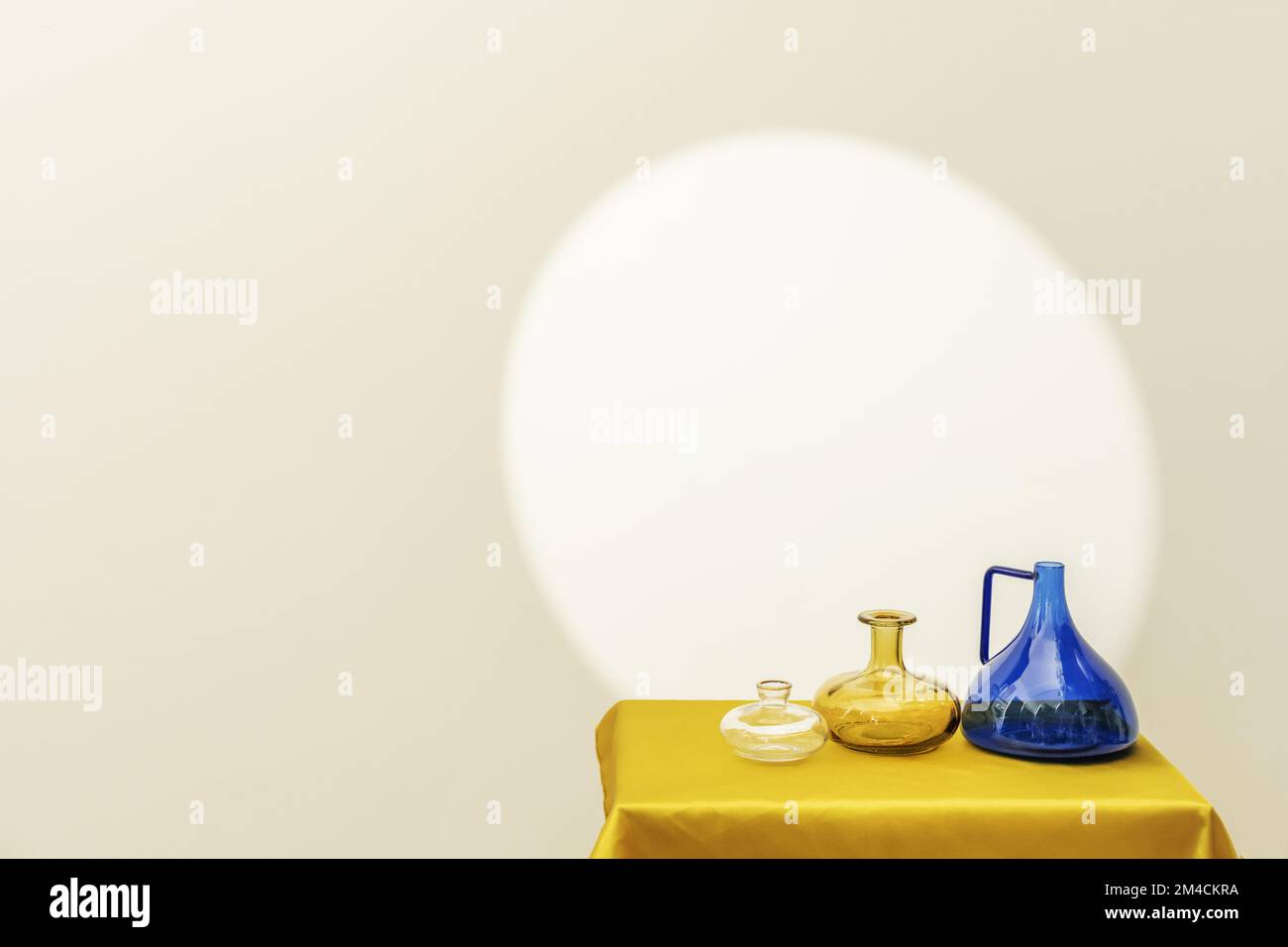 Image of decorative glass containers of different shades and colors on ...