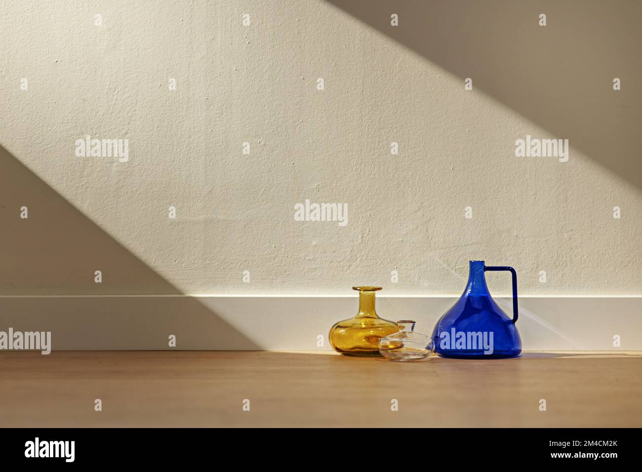 Image of decorative glass containers of different shades and colors ...