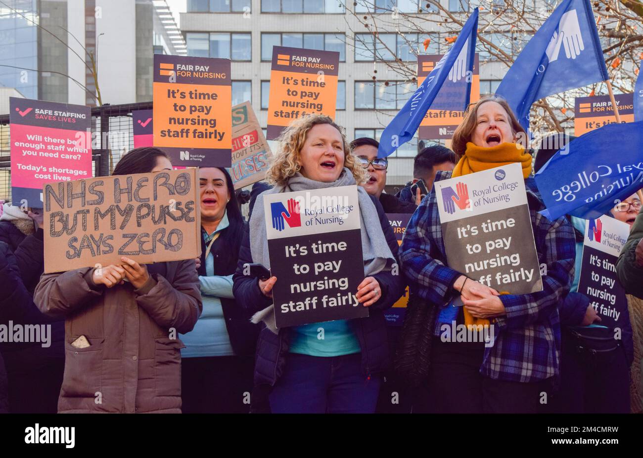 London, UK. 20th Dec, 2022. Nurses hold placards in support of fair pay ...