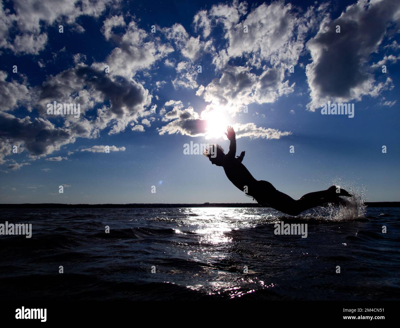 Blue sun suit hi-res stock photography and images - Alamy