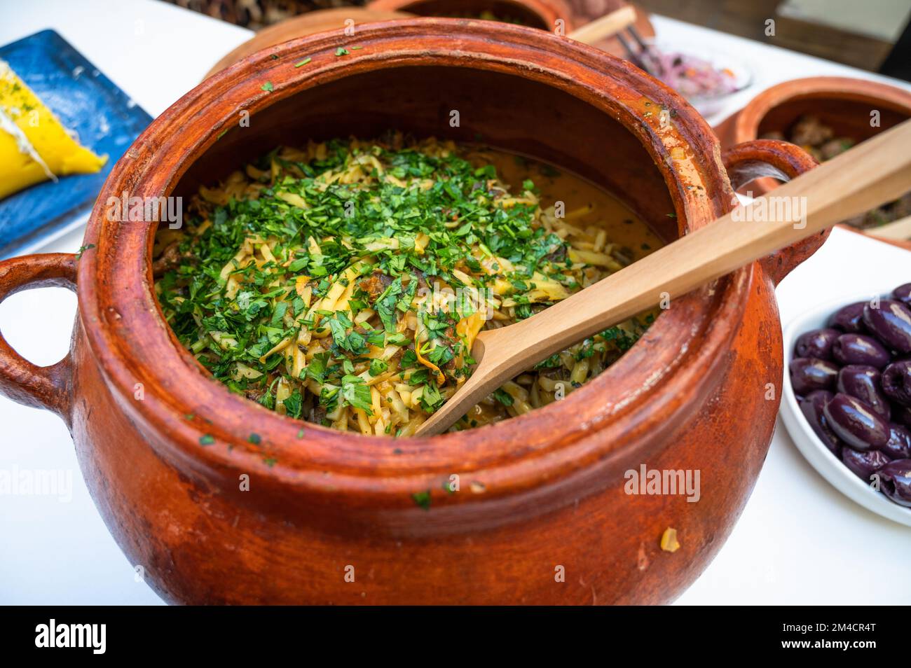 Traditional Peruvian Andean dish of Inca origin olluquito with charqui ...