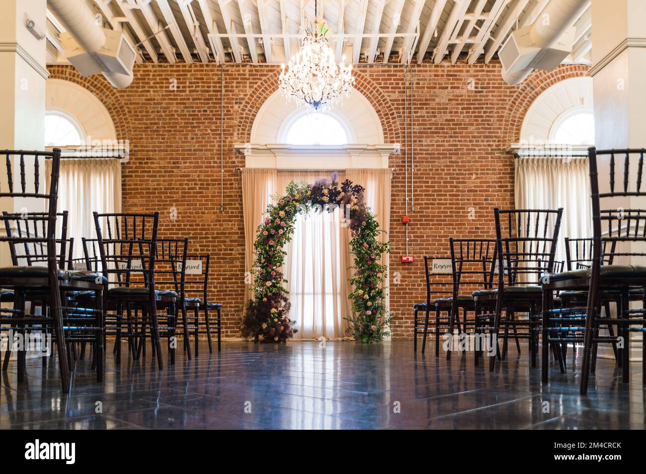Photograph of modern hip wedding venue and table setup Stock Photo - Alamy