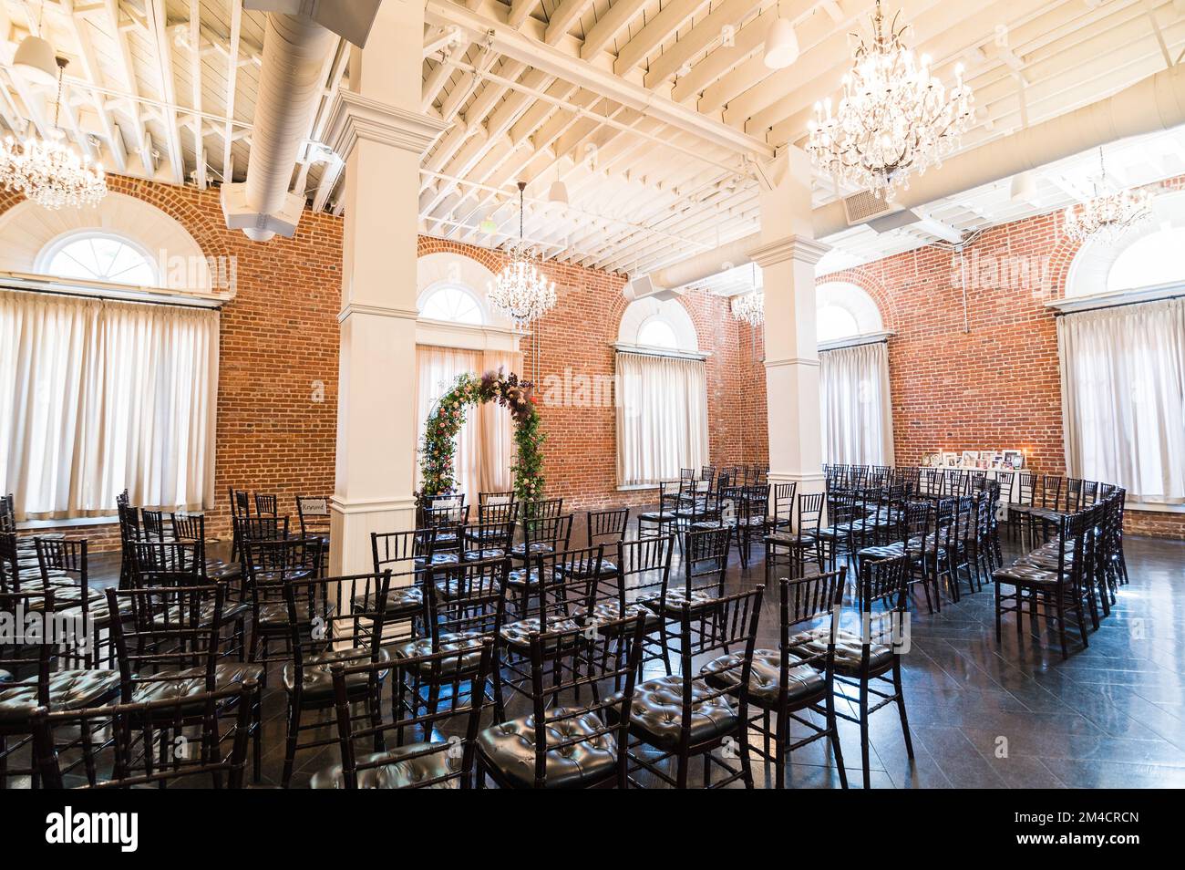 Photograph of modern hip wedding venue and table setup Stock Photo - Alamy