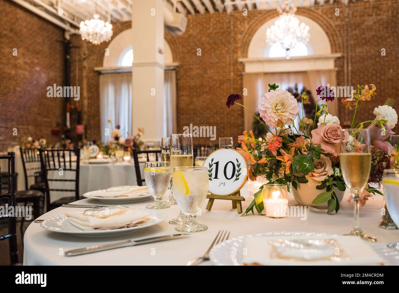 Photograph of modern hip wedding venue and table setup Stock Photo - Alamy