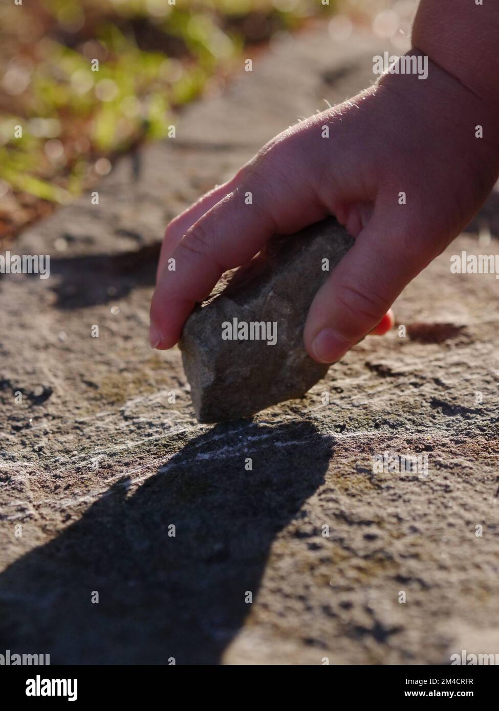 drawing stone hand Stock Photo - Alamy