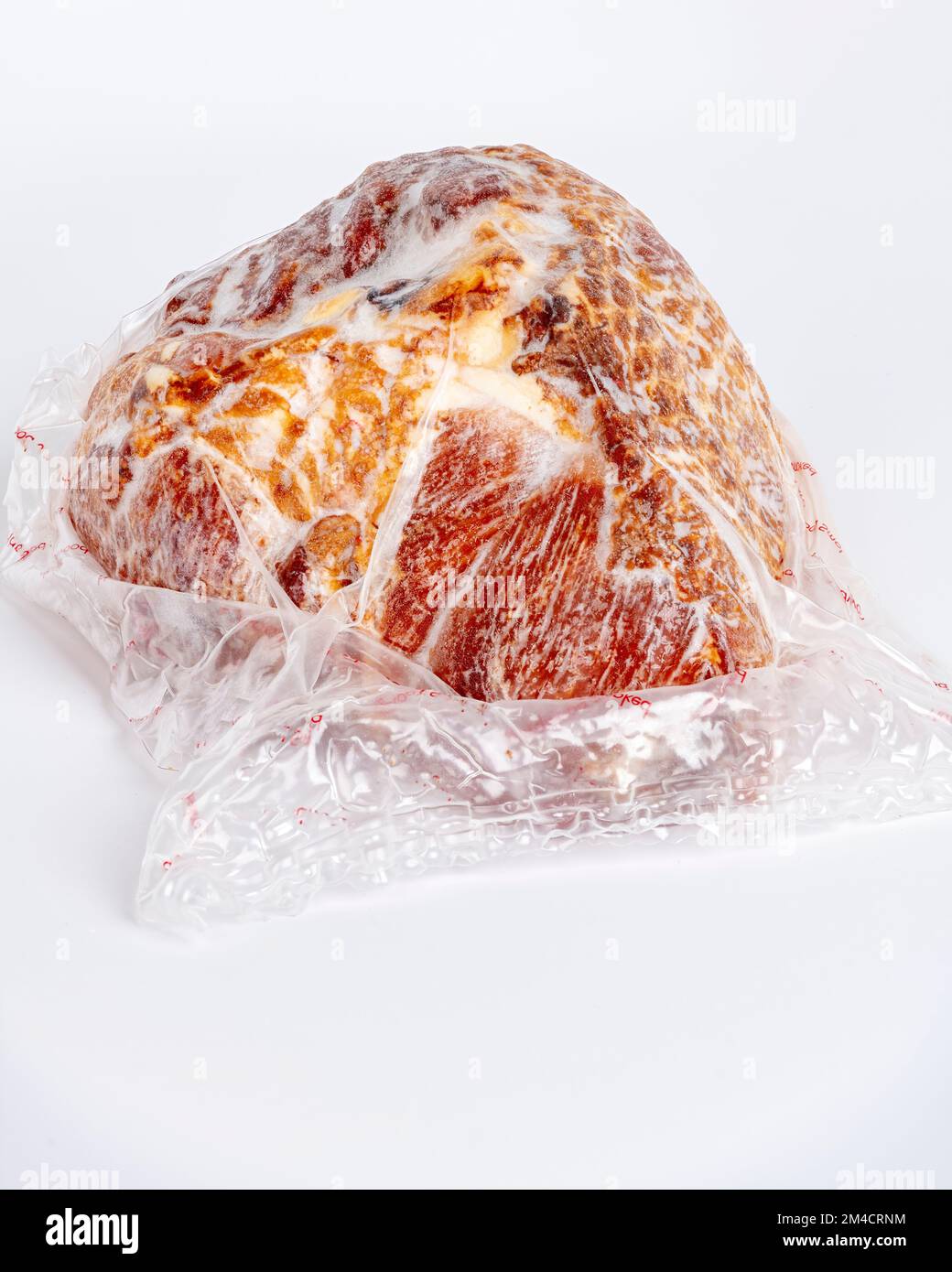 Ice formed on the outside of a holiday ham from the freezer Stock Photo ...