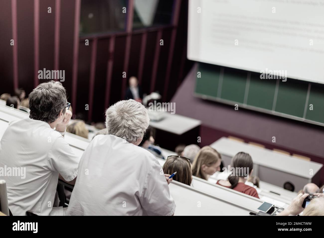 Lecturer at university. Healthcare expert giving a talk to medical ...