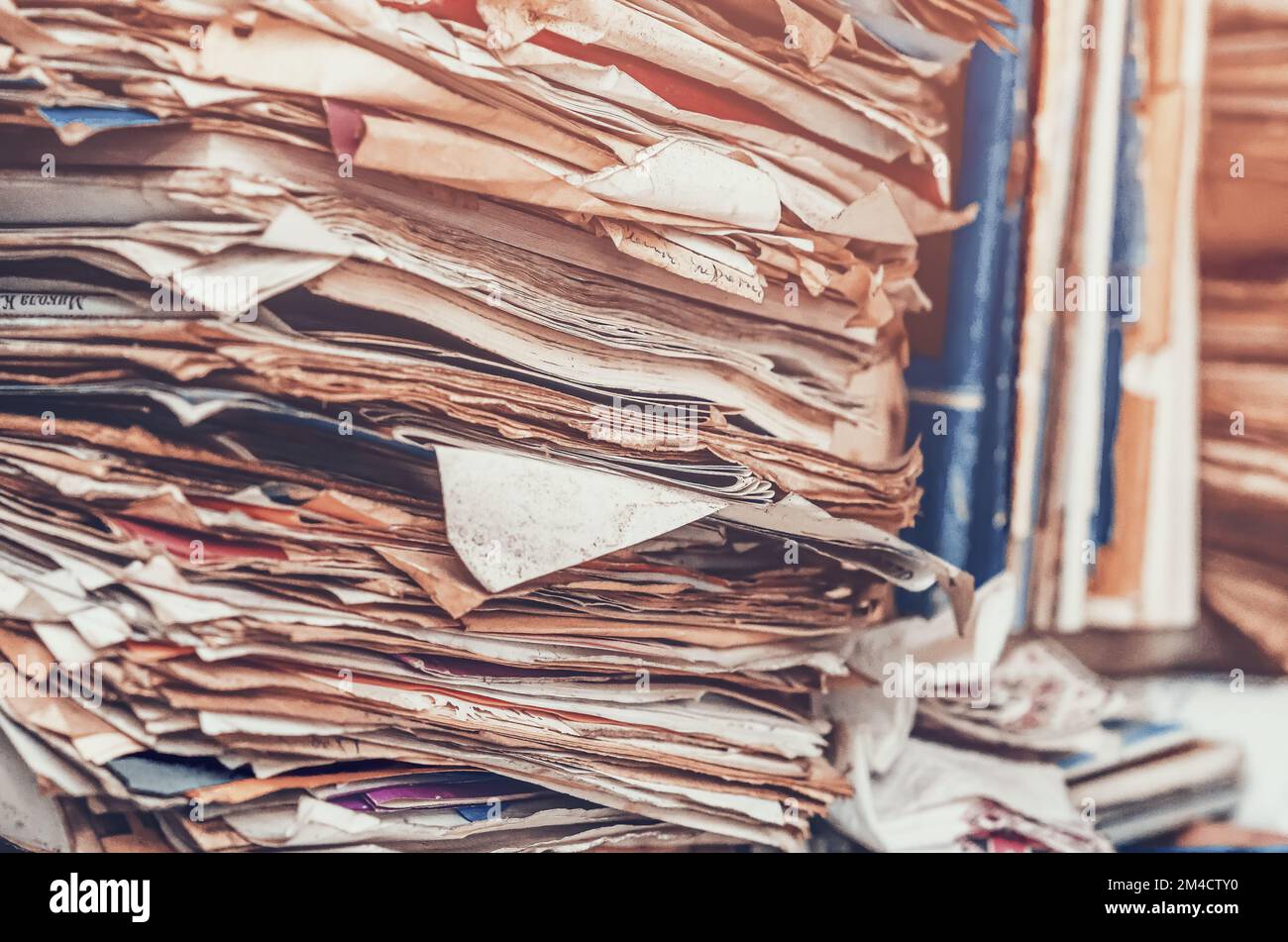 Documents, old papers in folders on shelves are stacked in a mess Stock ...