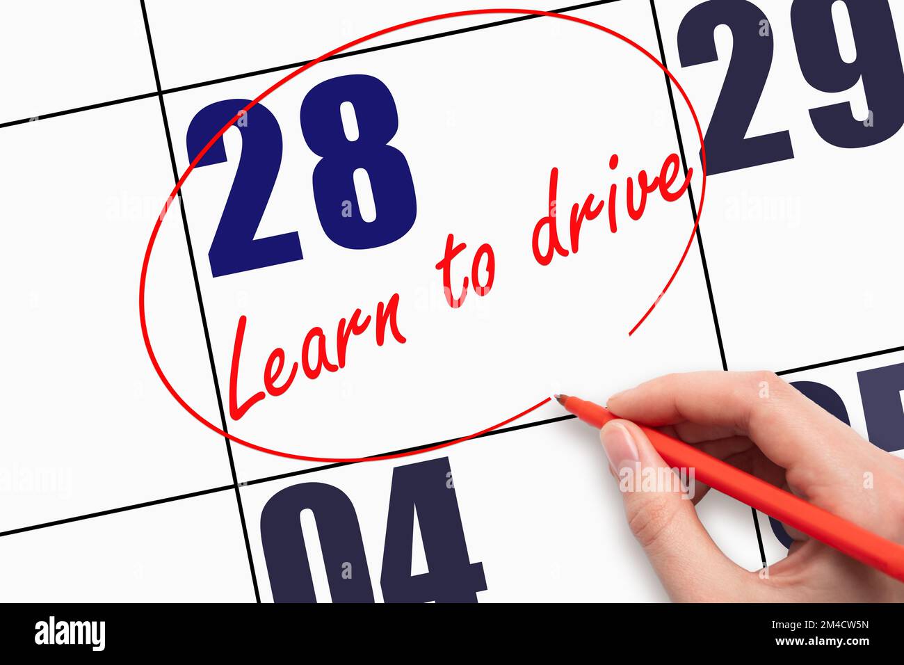 28th day of the month. Hand writing text LEARN TO DRIVE on calendar ... 28th day of the month. Hand writing text LEARN TO DRIVE on calendar ...