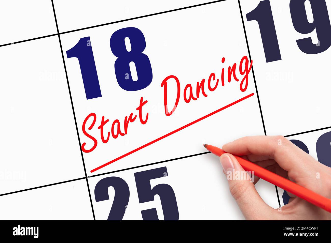 18th day of the month. Hand writing text START DANCING and drawing a ...