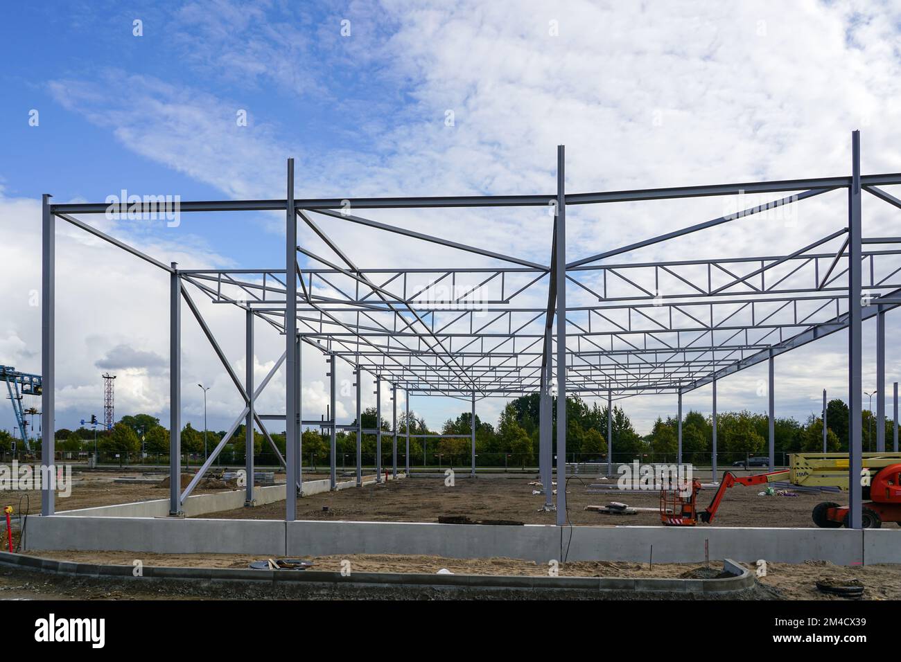 Assembled steel framework of new modern warehouse building with ...