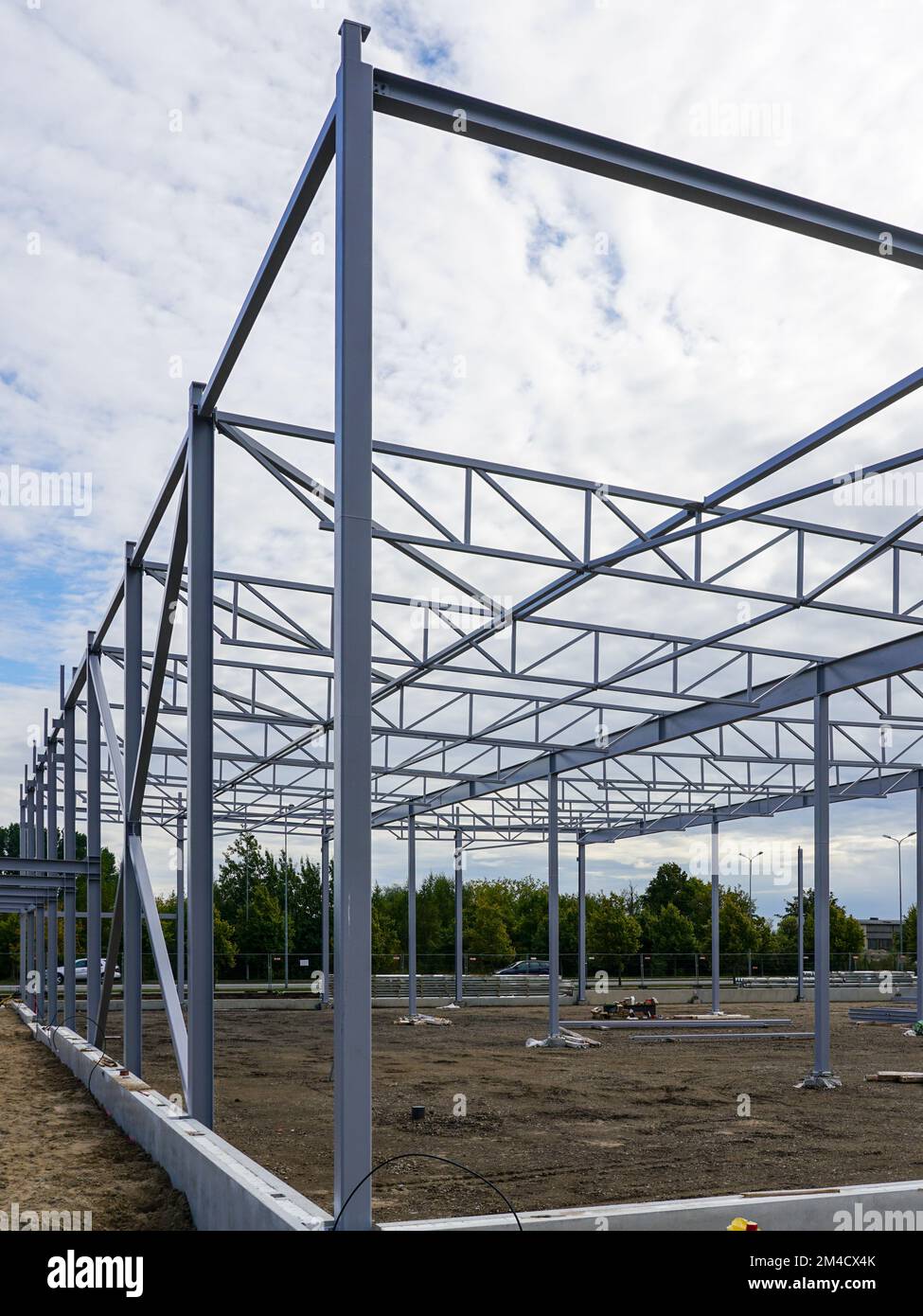 Assembled steel framework of new modern warehouse building with ...