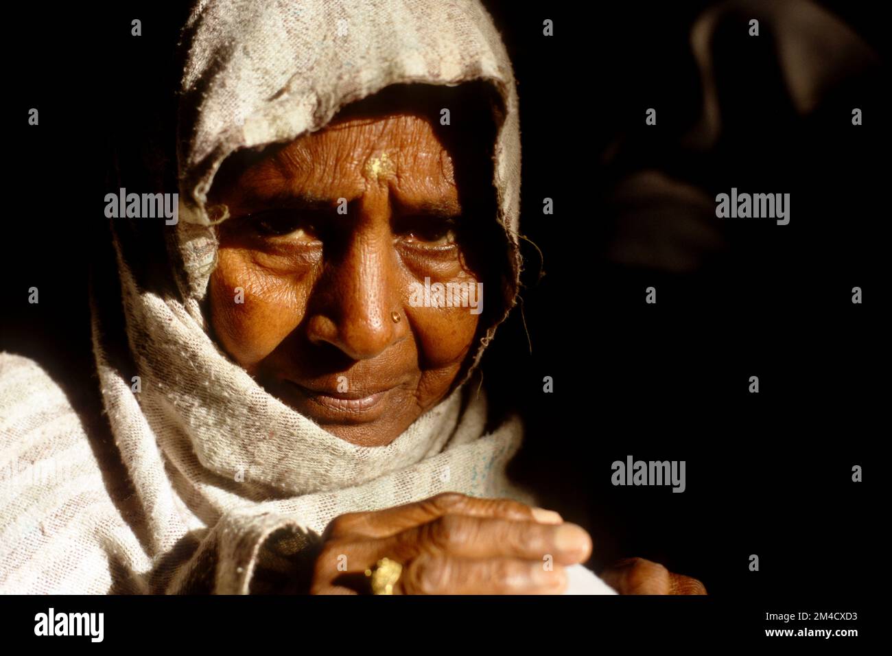 Old widow living a sad live in one of the widowhouses of vrindaban ...