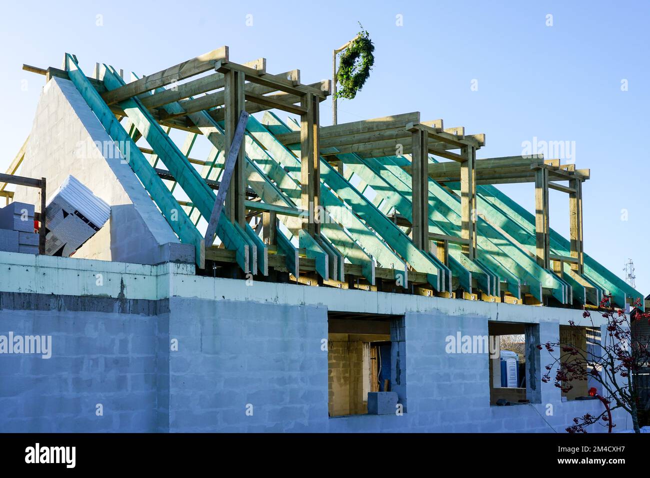 Unfinished wooden structures for the roof of a cement block residential ...