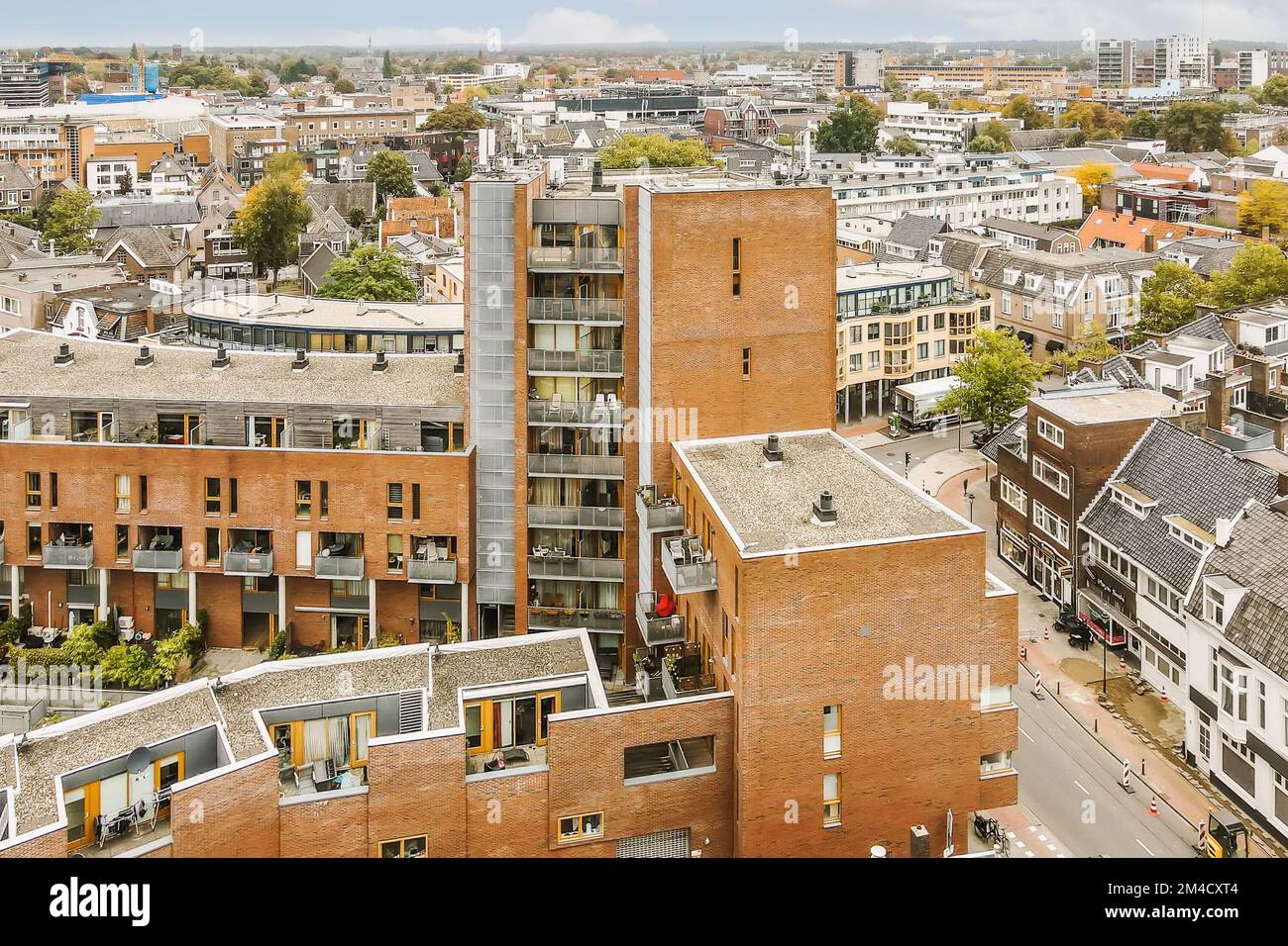 an aerial view of a city from the top of a tall building, with ...