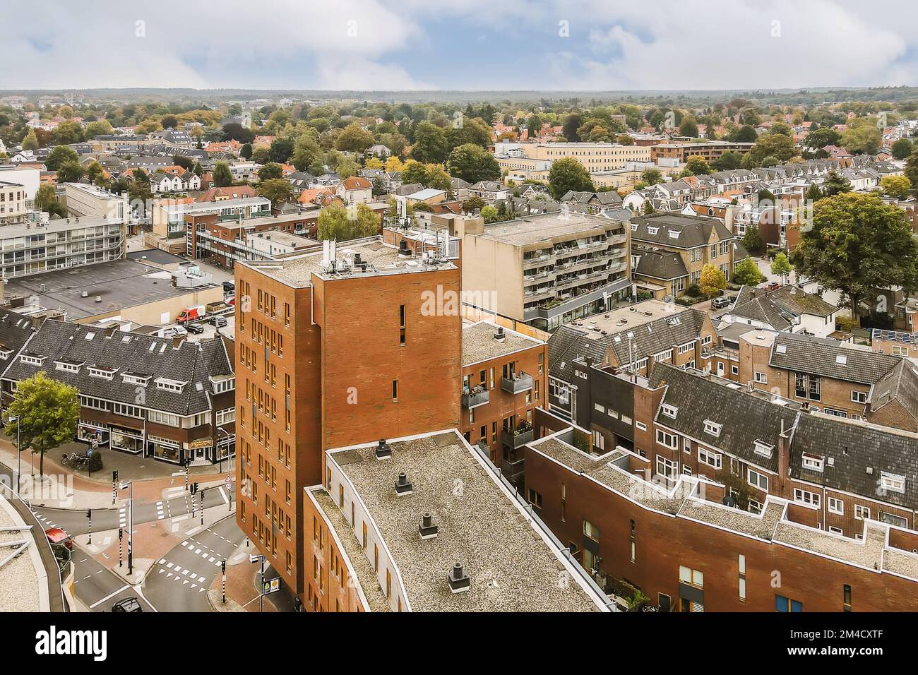 a city with buildings and trees in the fore - image was taken from an ...