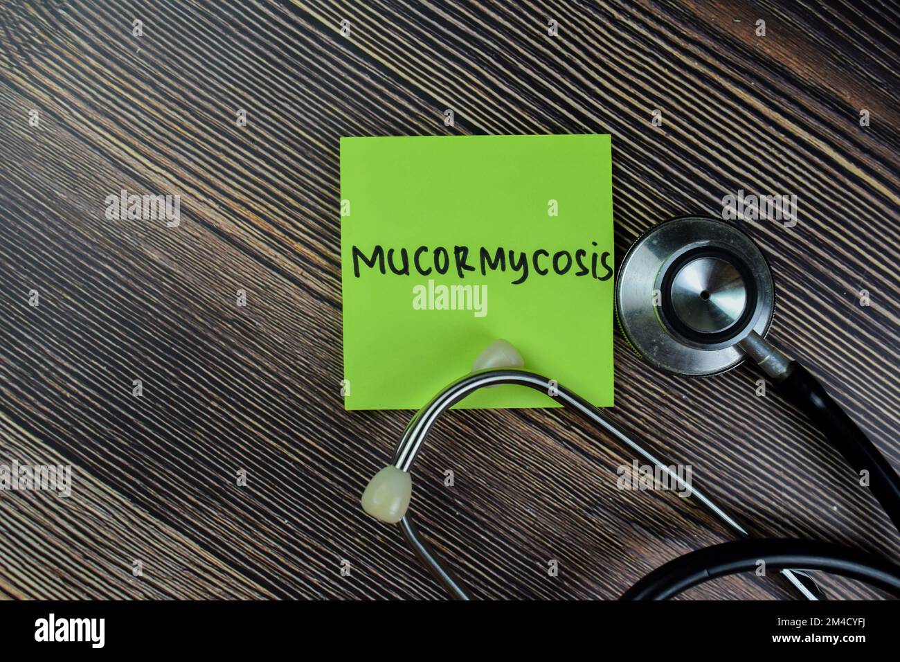 Concept of Mucormycosis write on sticky notes with stethoscope isolated ...