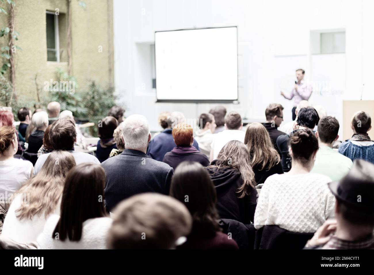 Speaker Giving a Talk at Business Meeting. Audience in the conference ...