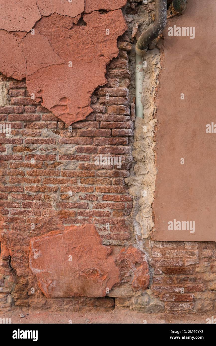 Background photo of an old rugged texturized brick wall Stock Photo - Alamy