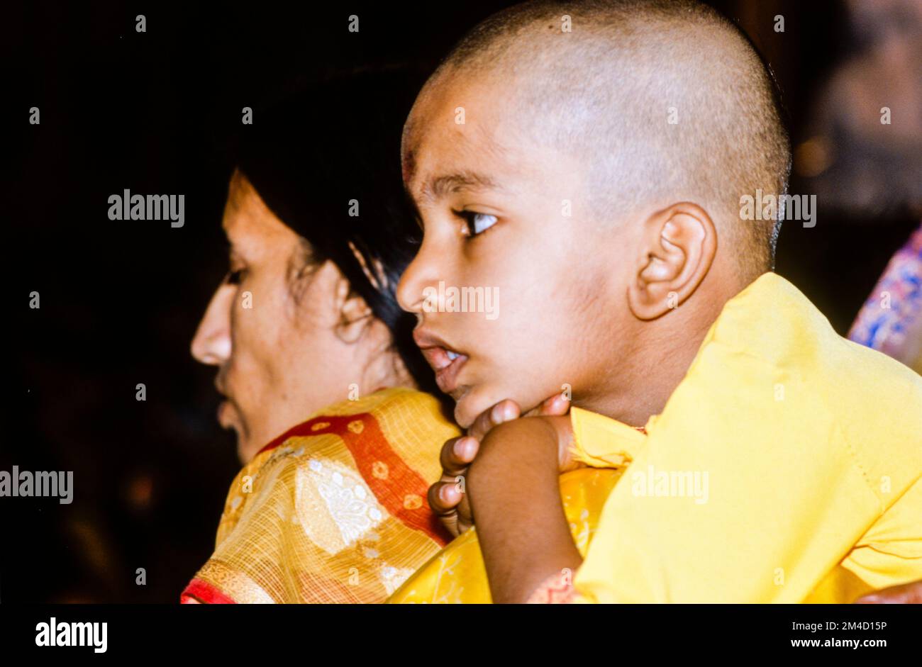 Brahmin-Boy watching his frieds performing the Aartii-Ceremony at ...