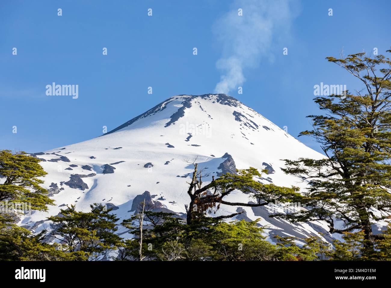 Villarrica volcano with a big column of smoke; Pucon, Chile Stock Photo ...