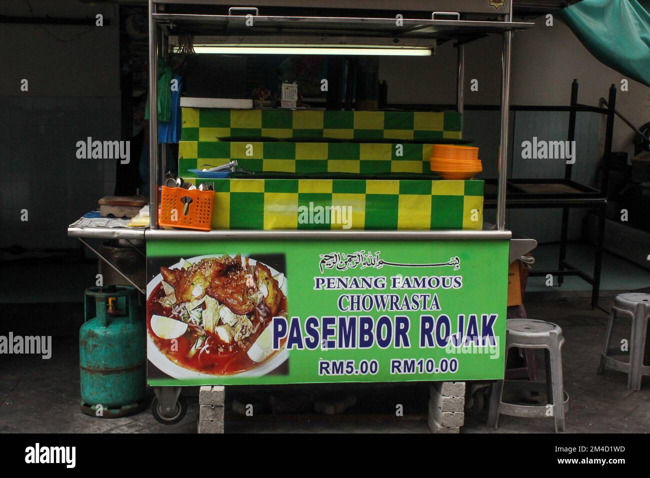 Georgetown, Penang, Malaysia - November 2012: A green roadside hawker ...