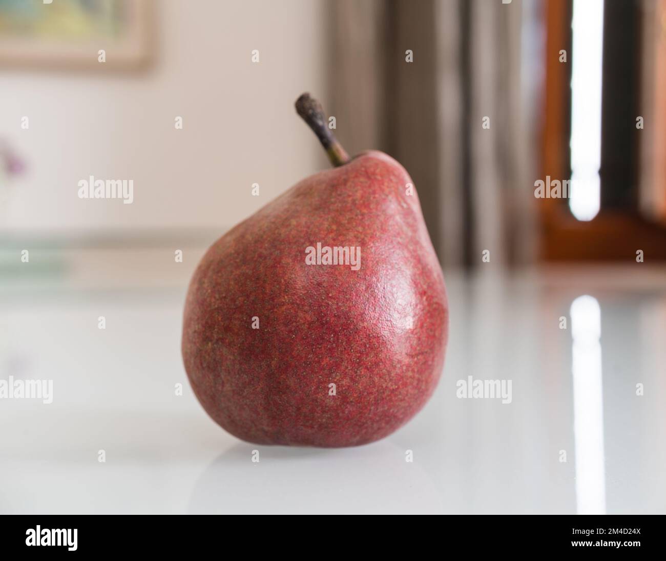 Red crimson pear hi-res stock photography and images - Alamy