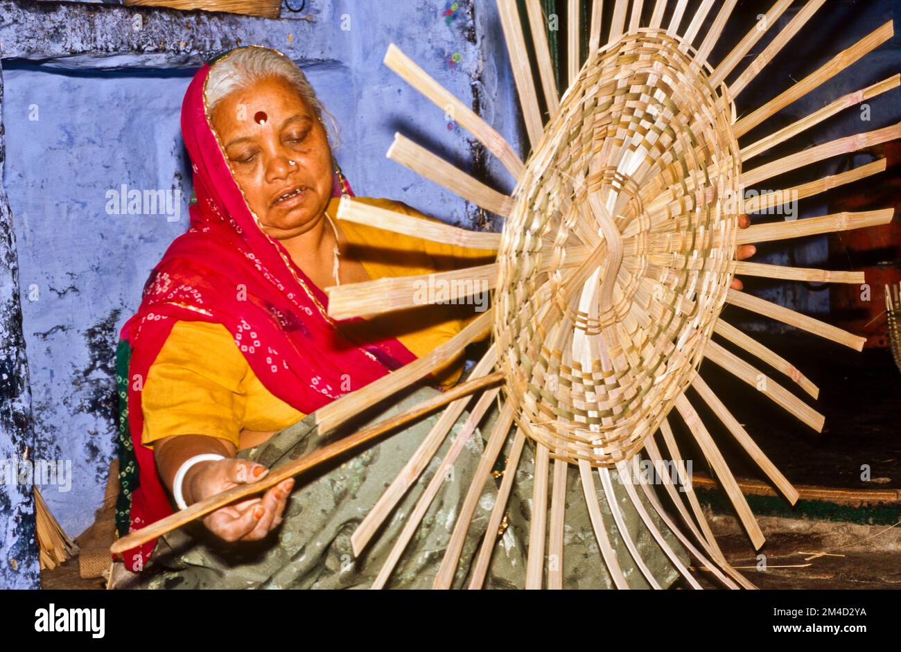 Local woman making baskets from bamboo Stock Photo - Alamy