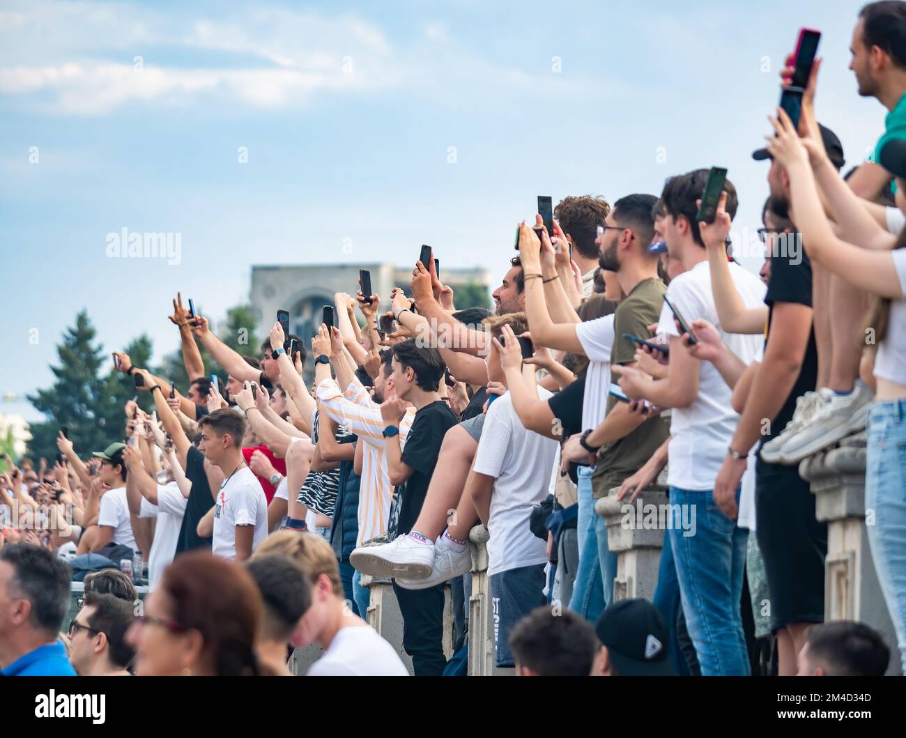 Bucharest, Romania -September 2022: Crowd of people taking photos and ...