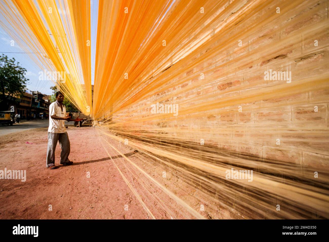Dying threads for industrial use Stock Photo - Alamy