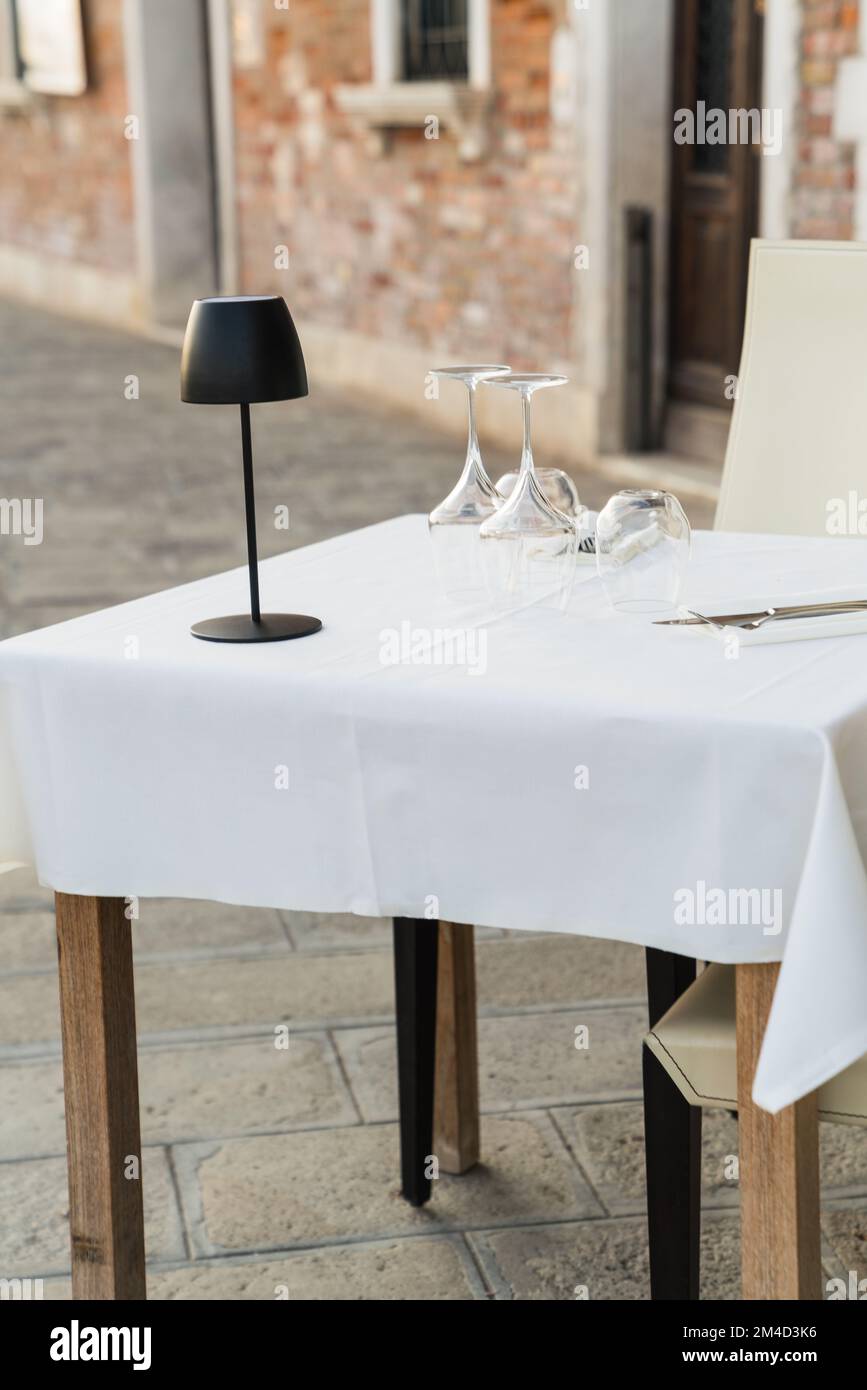 Fancy restaurant setup outdoors in Venice, Italy Stock Photo - Alamy