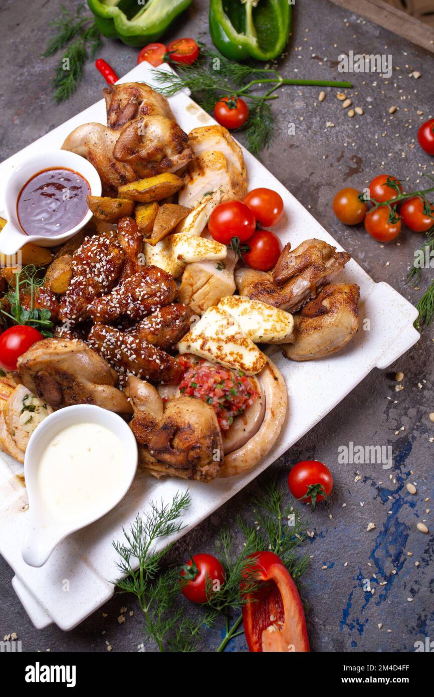 meat chicken platter, wings, baked chicken dish for the company Stock ...